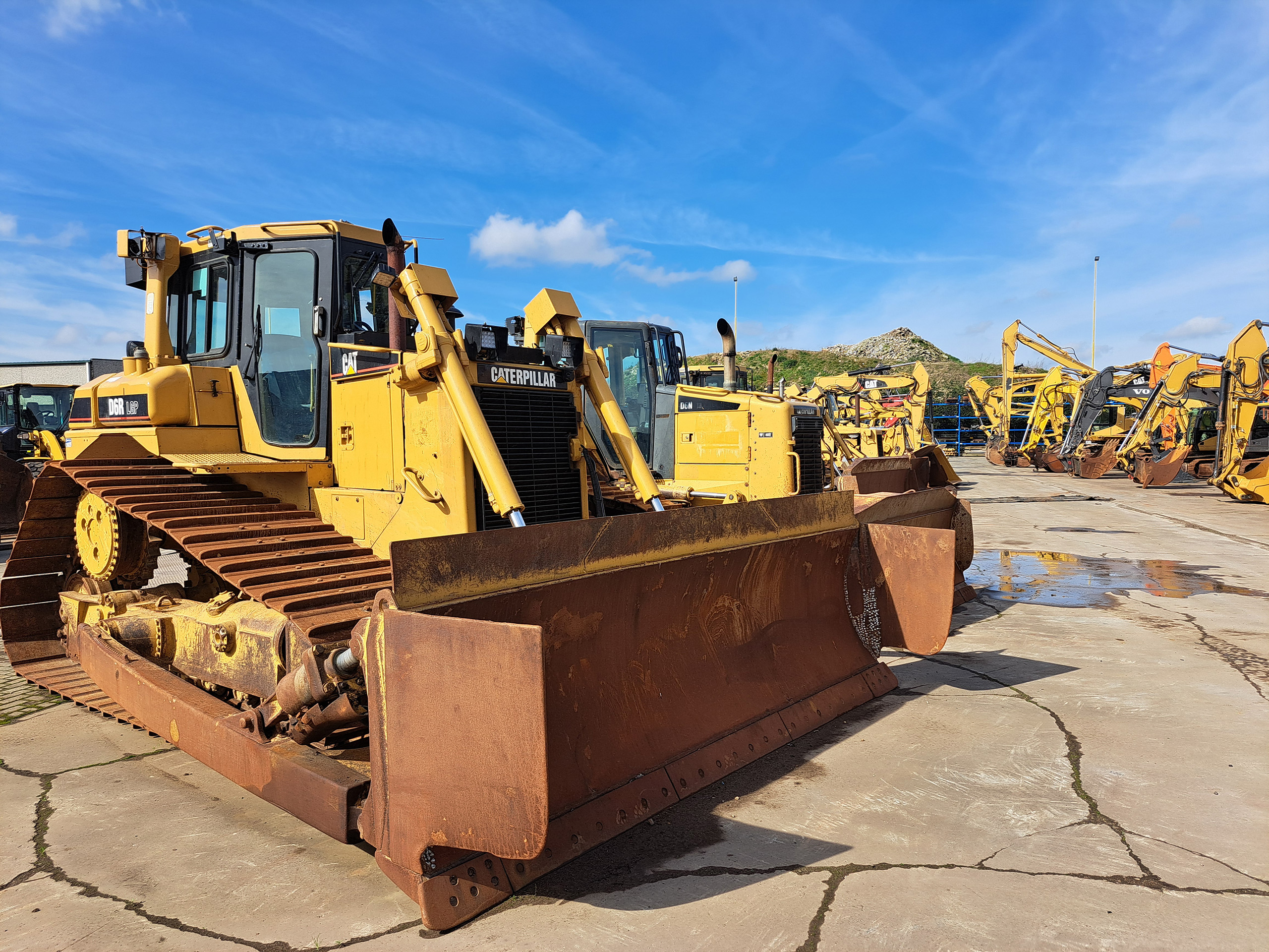 Bulldozers - Adriaanse Ruitenservice